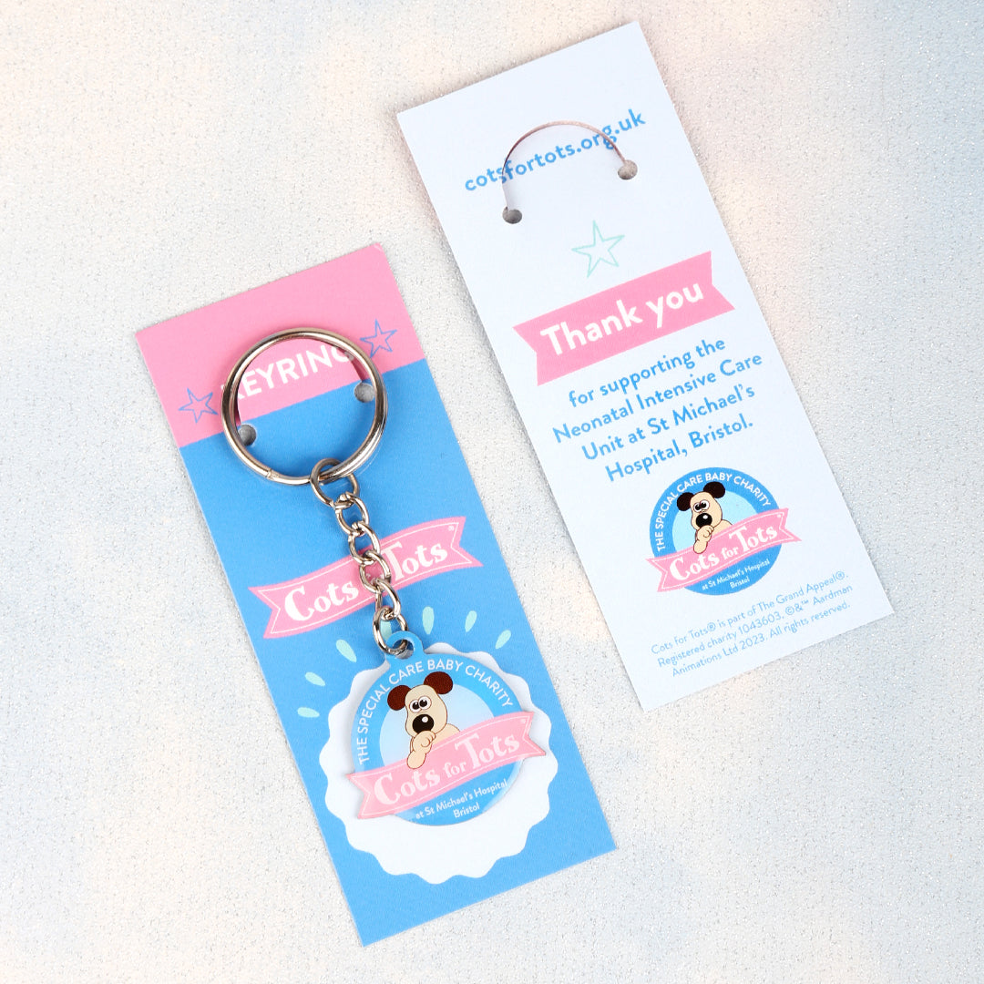 Cots for Tots Logo Keyring – Gromit Unleashed Shop